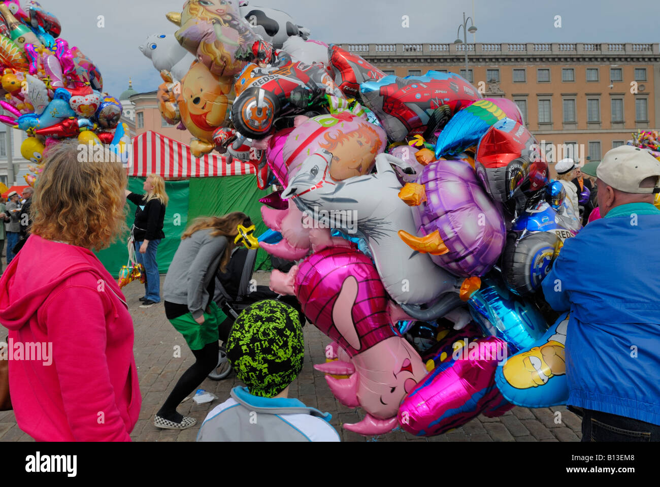 Balloon man at Helsinki Market square. The only carnival-like ...