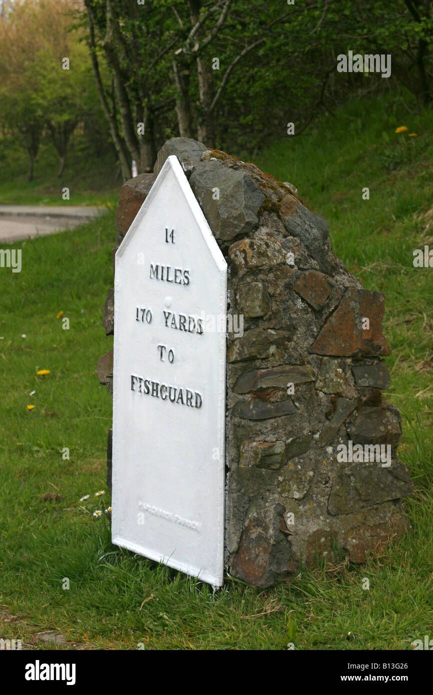 Milestone 14 miles to Fishguard by roadside .Vertical . Milestone 31396 ...