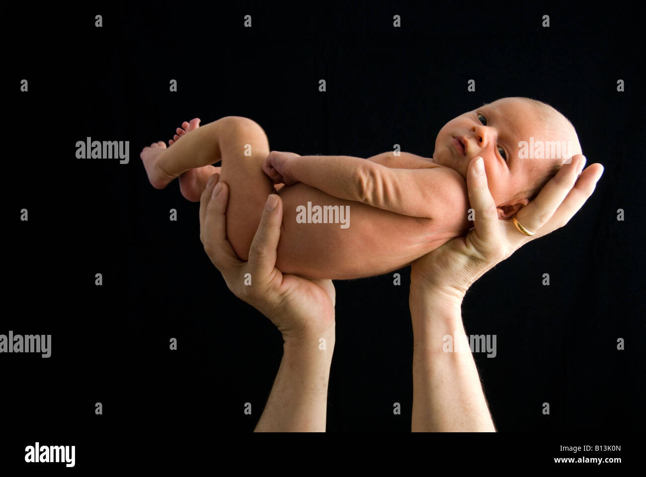 Joshua Kailas Hudson Newborn Baby Boy Aged 9 Days in Hands of Father ...