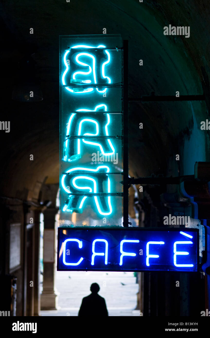 Neon Caffe Sign in a dark alley leading to Saint Marks Square, Venice ...