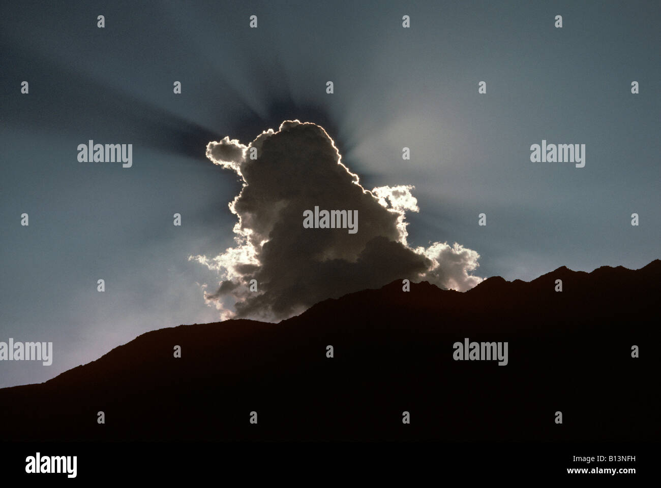 Silver Lined Clouds. Sun Rays. Blue Sky. Mountains. Color Variation ...