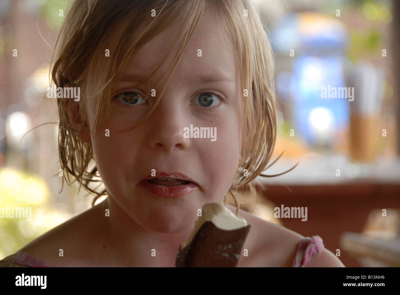 Lucy eating ice cream with shocked expression, Thailand Stock Photo - Alamy