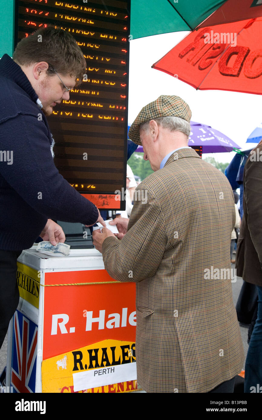 Punter betting at Bookies Perth Racecourse, Gold Cup Day, Tayside ...