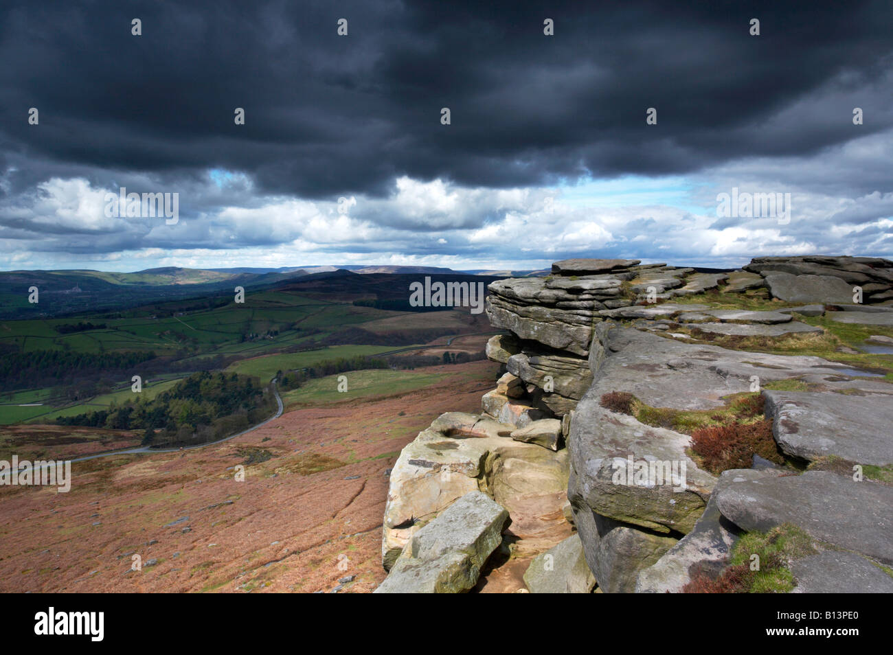 Stanage Edge in the Peak District during a passing storm Stock Photo ...