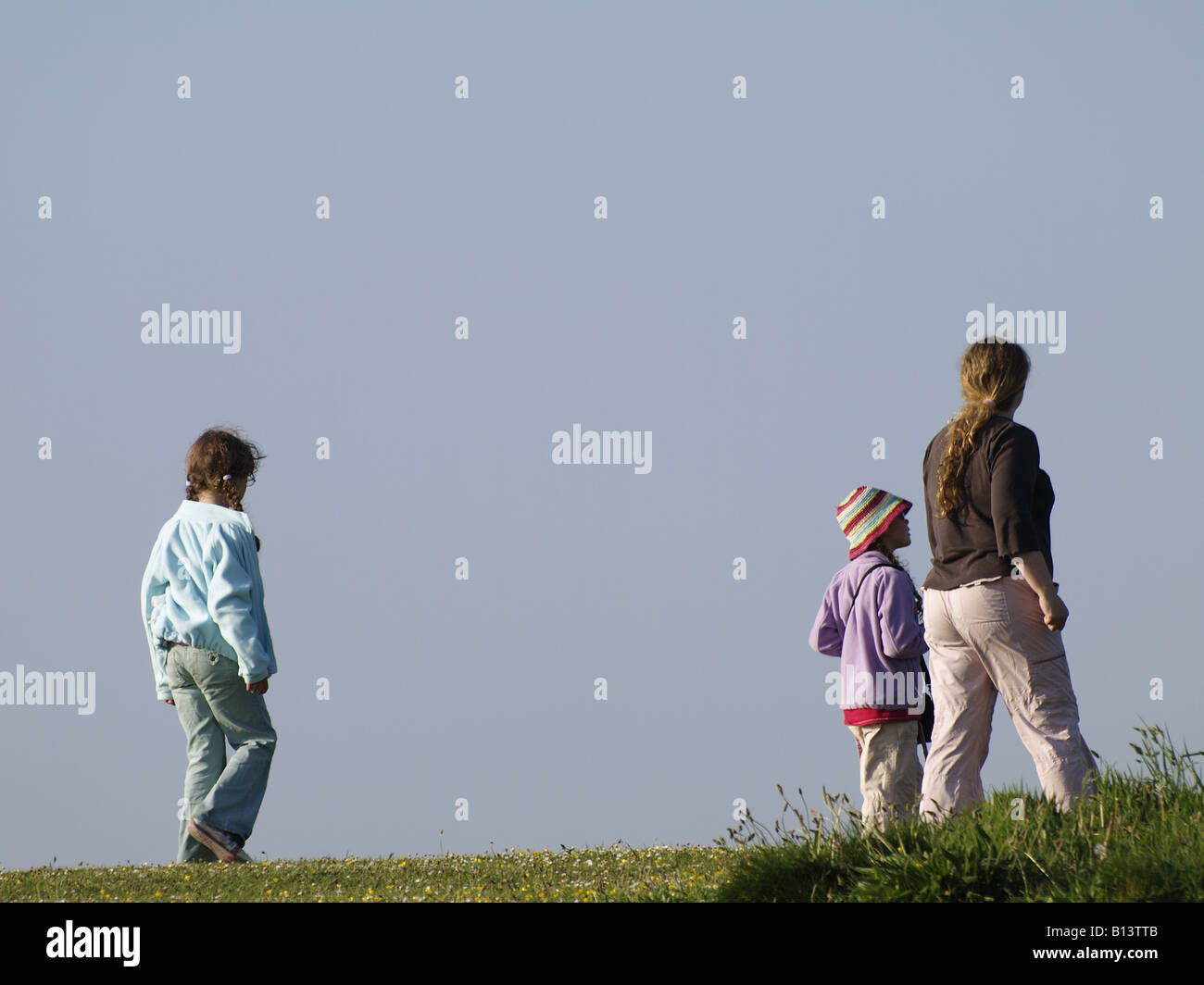 Children following mother hi-res stock photography and images - Alamy