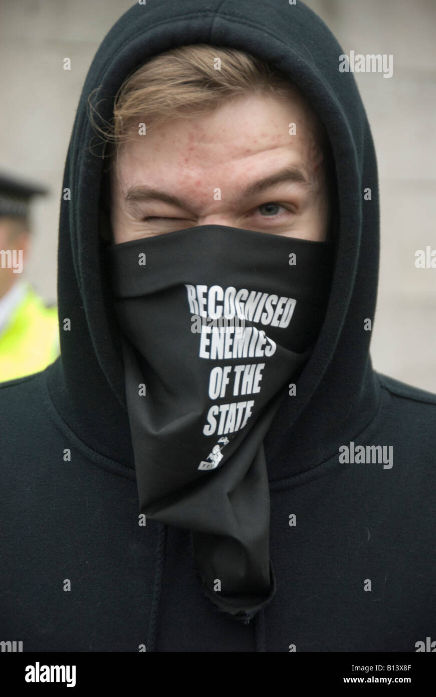 Anarchist protester against police pay march wears mask 'Recognised ...