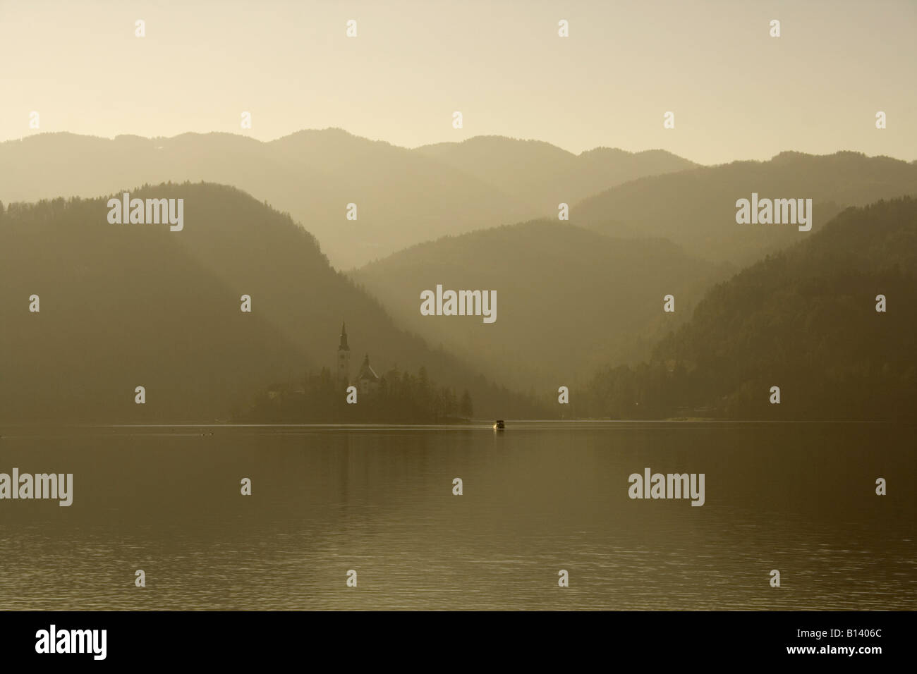 Lake Bled, Slovenia, Europe, looking ethereal in the afternoon haze and ...
