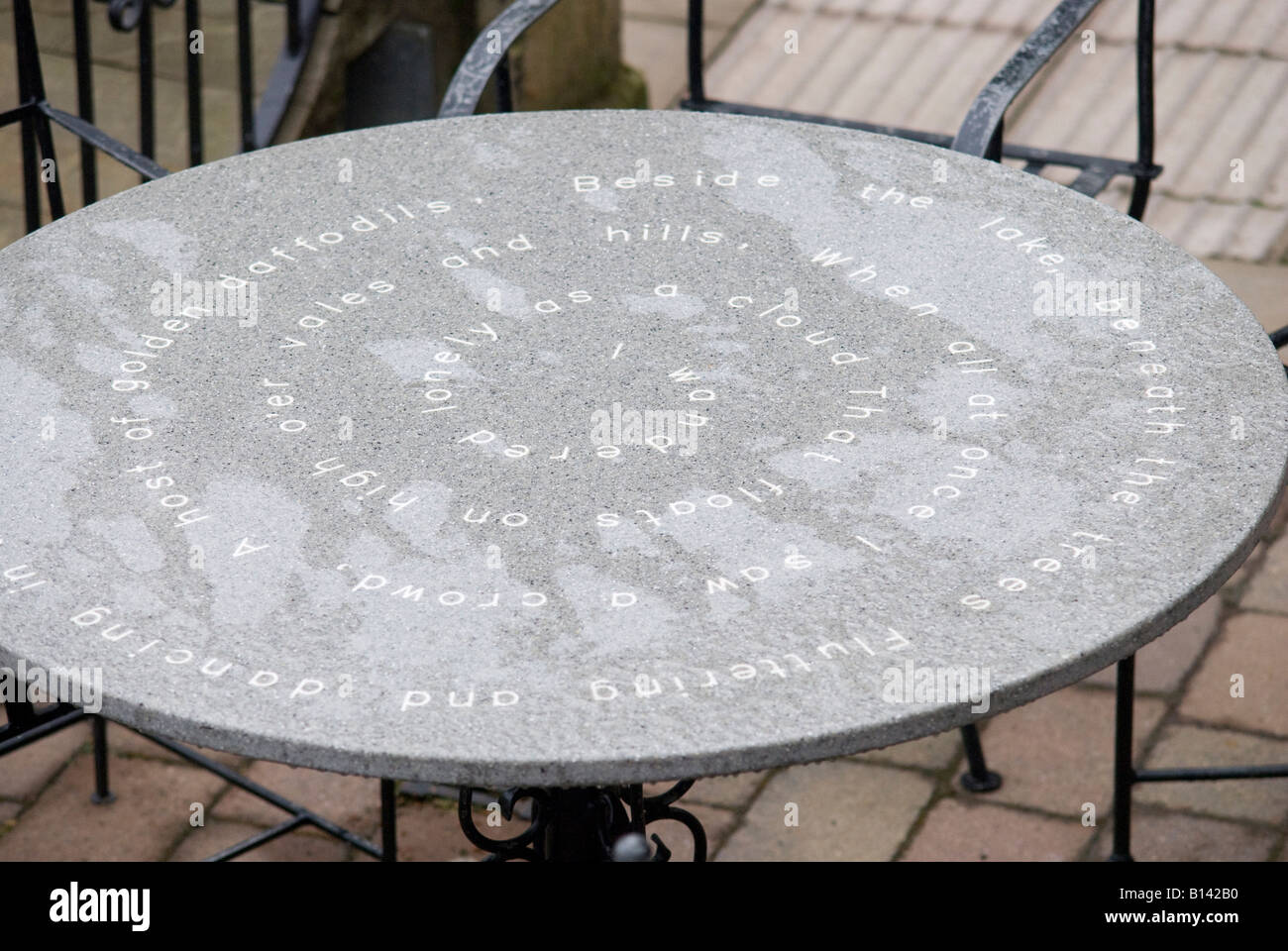 cafe table with wordsworth poetry engraving Stock Photo - Alamy