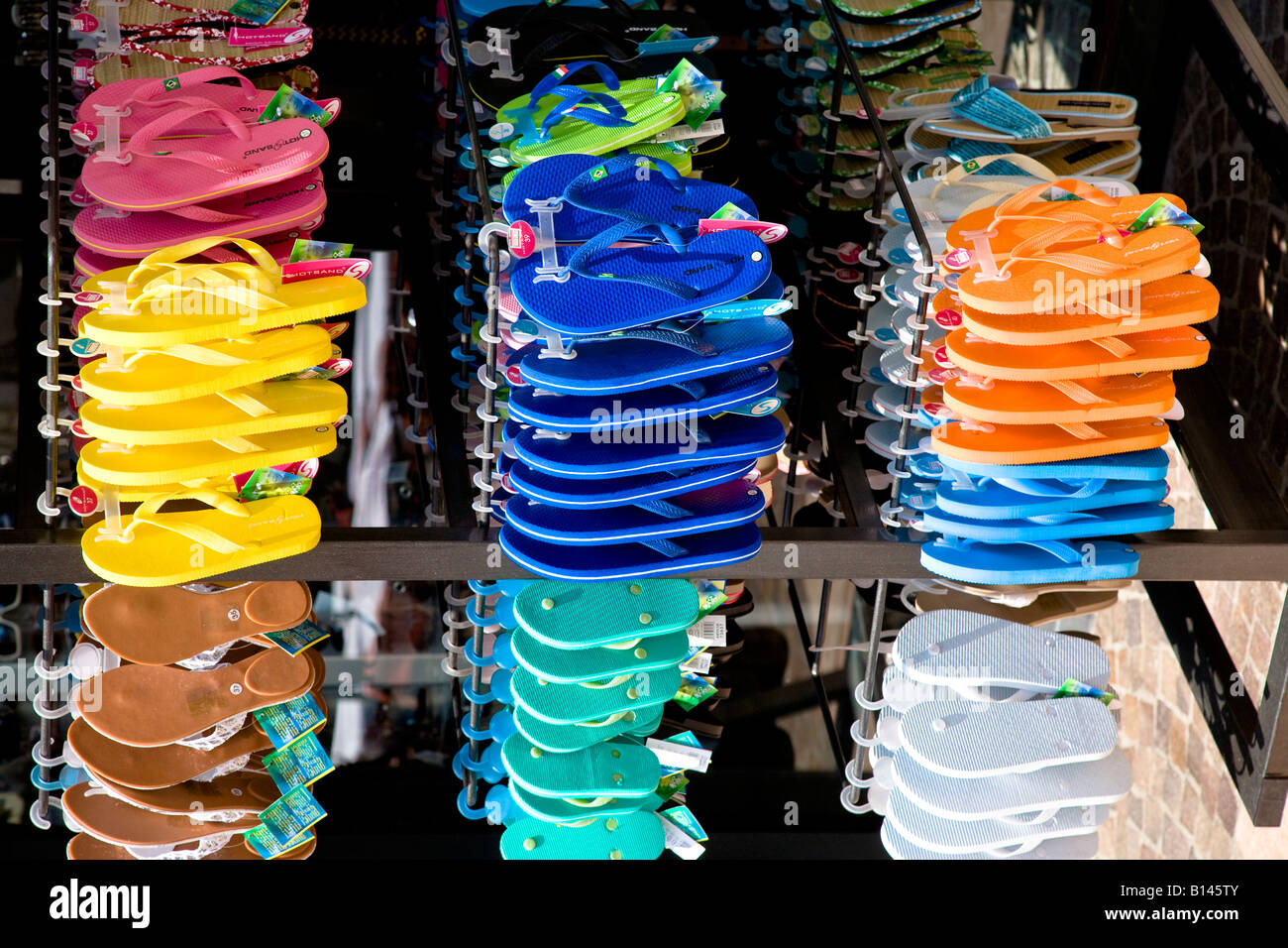 Childrens Coloured plastic beach sandles Stock Photo - Alamy