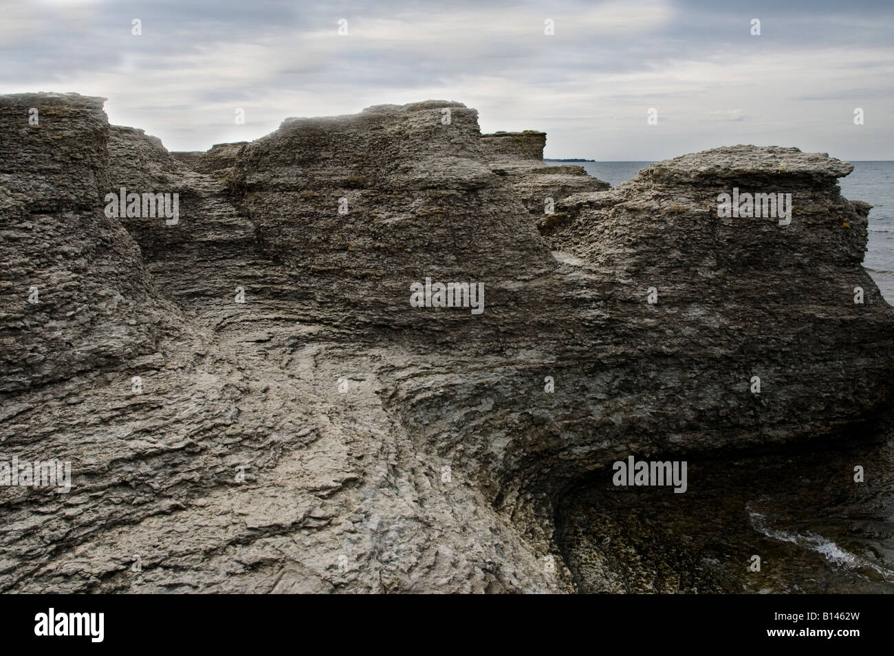 The layered eroded limestone pillars at Byerum Rauker Oland Sweden ...
