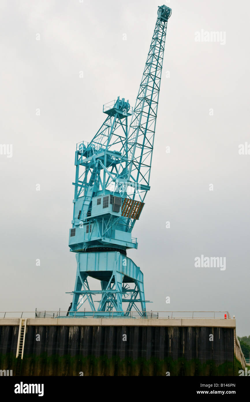 Old renovated dockside lifting crane, portrait photograph Stock Photo ...