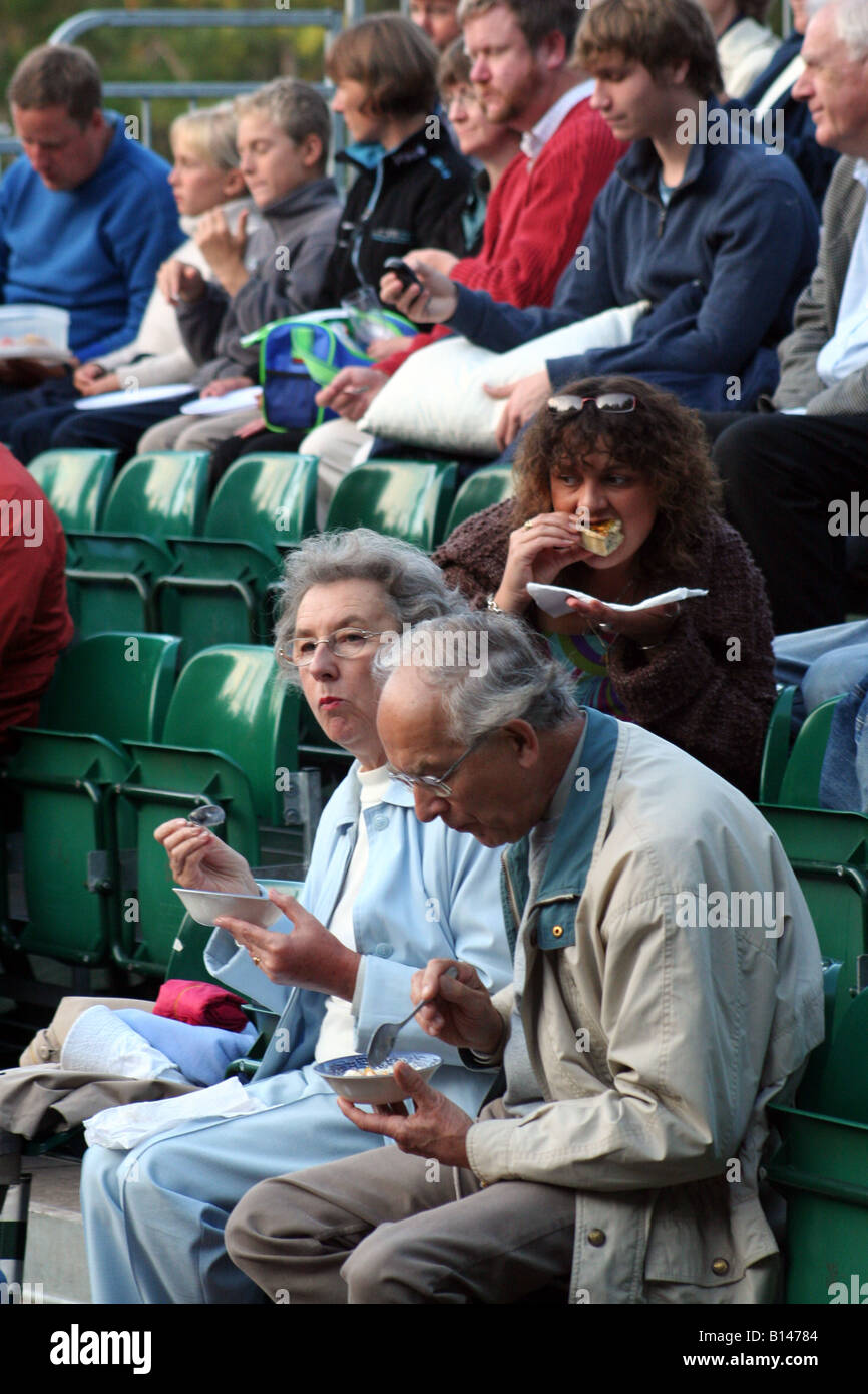 The audience eating before an outdoor performance of Hamlet Stock Photo ...