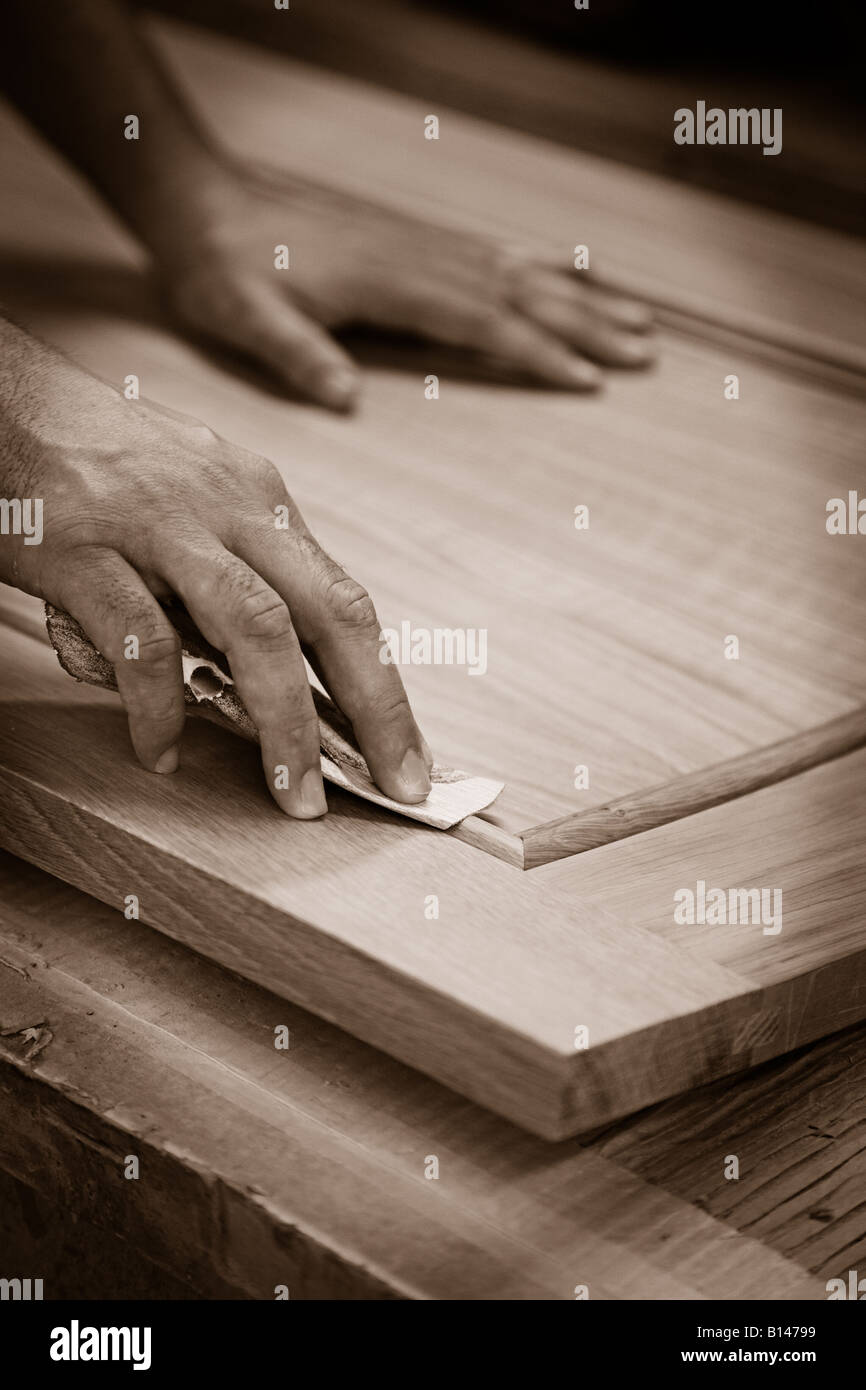 Close up craftsman hands sanding hi-res stock photography and images ...