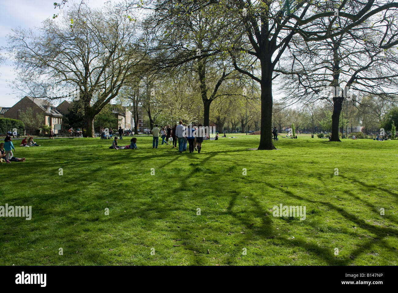 People Spring children london fields park pirates park Stock Photo - Alamy