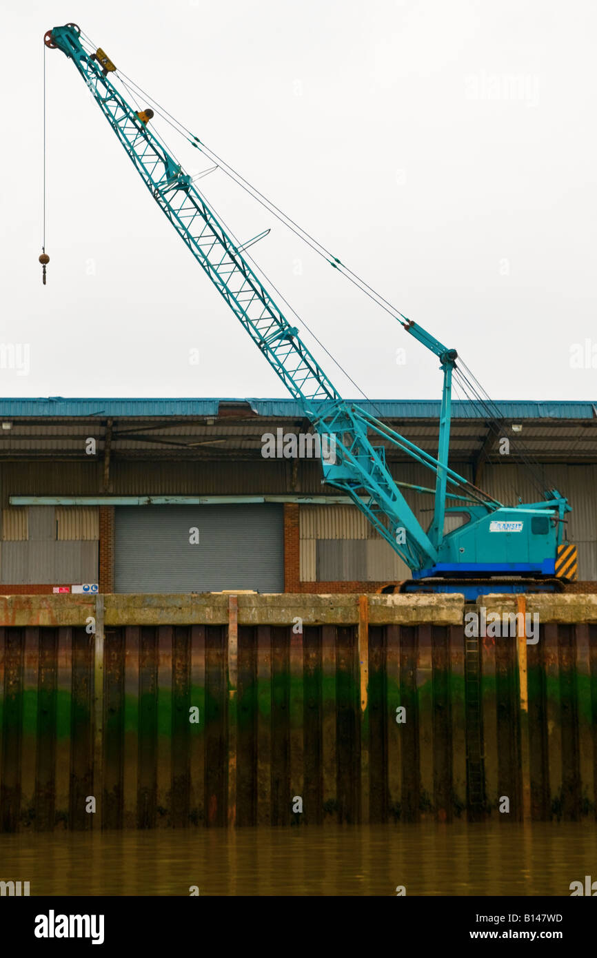 Dockside lifting crane, portrait photograph Stock Photo - Alamy