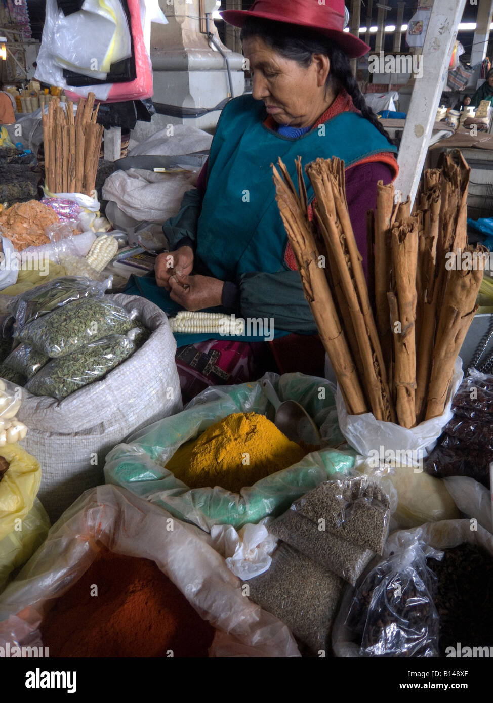 Woman selling spices in Cusco market, Peru Stock Photo - Alamy