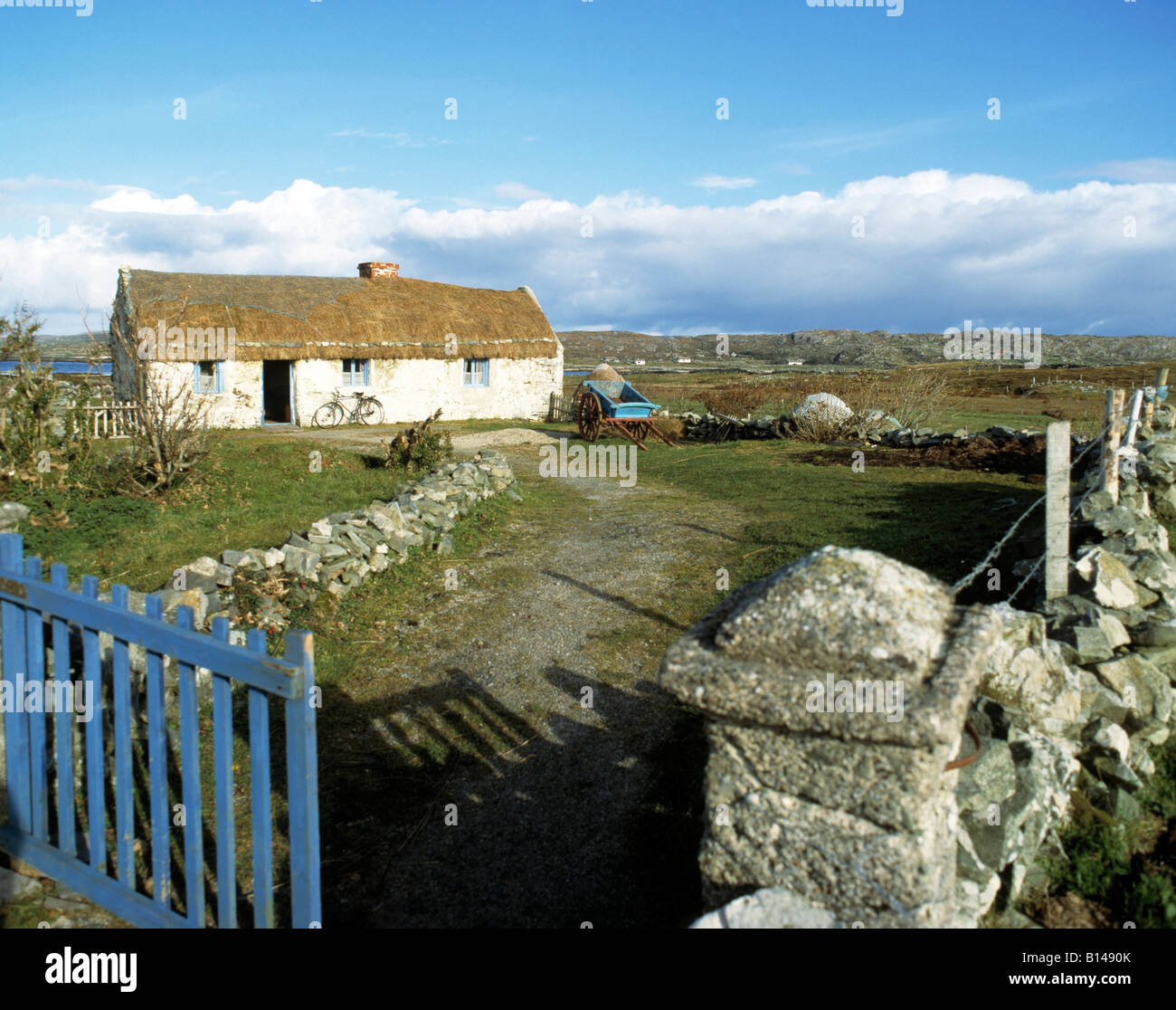 typical old thatched dwelling sits in the irish landscape Stock Photo ...