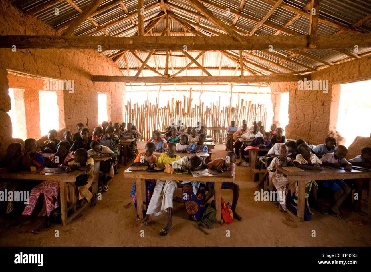 Children attend class at the Kabiline I Primary school in the village ...