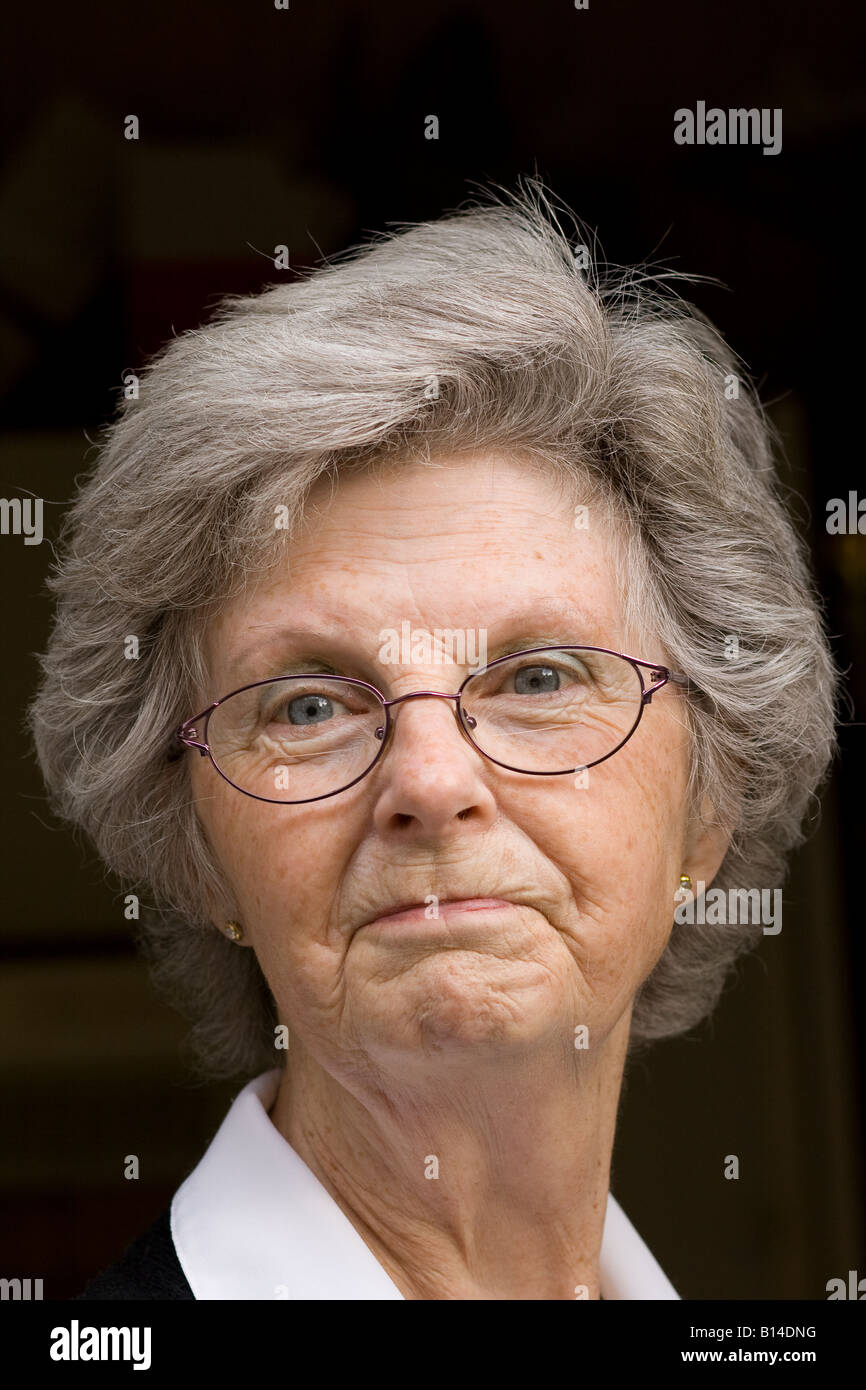 Elderly lady wearing glasses hi-res stock photography and images - Alamy