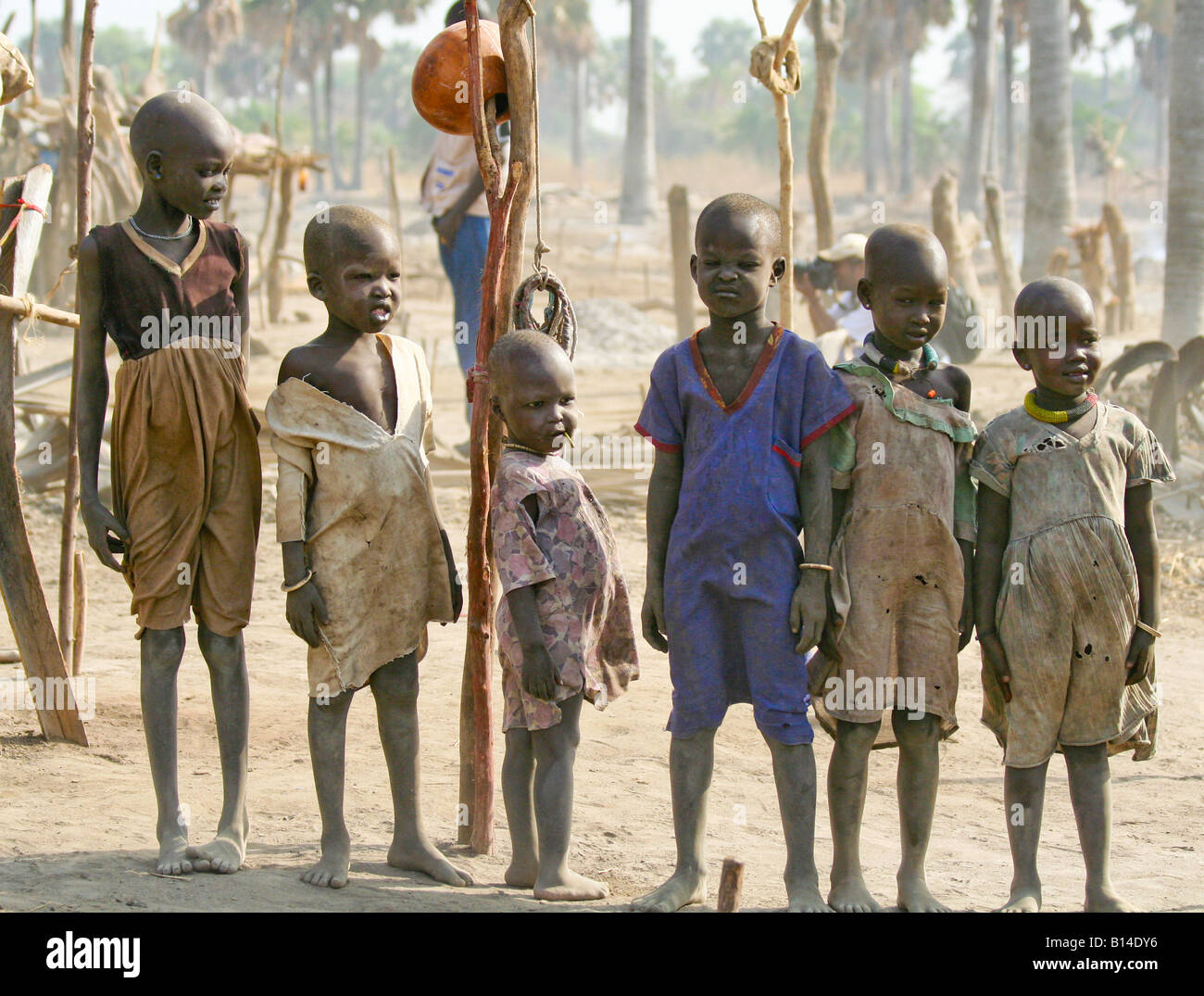 Children growing up in a Dinka cattle camp. The Dinka traditionally ...