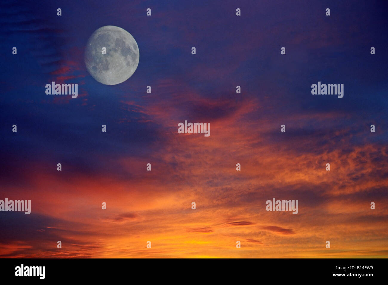 Moon juxtaposed with evening sky using double exposure technique Stock ...