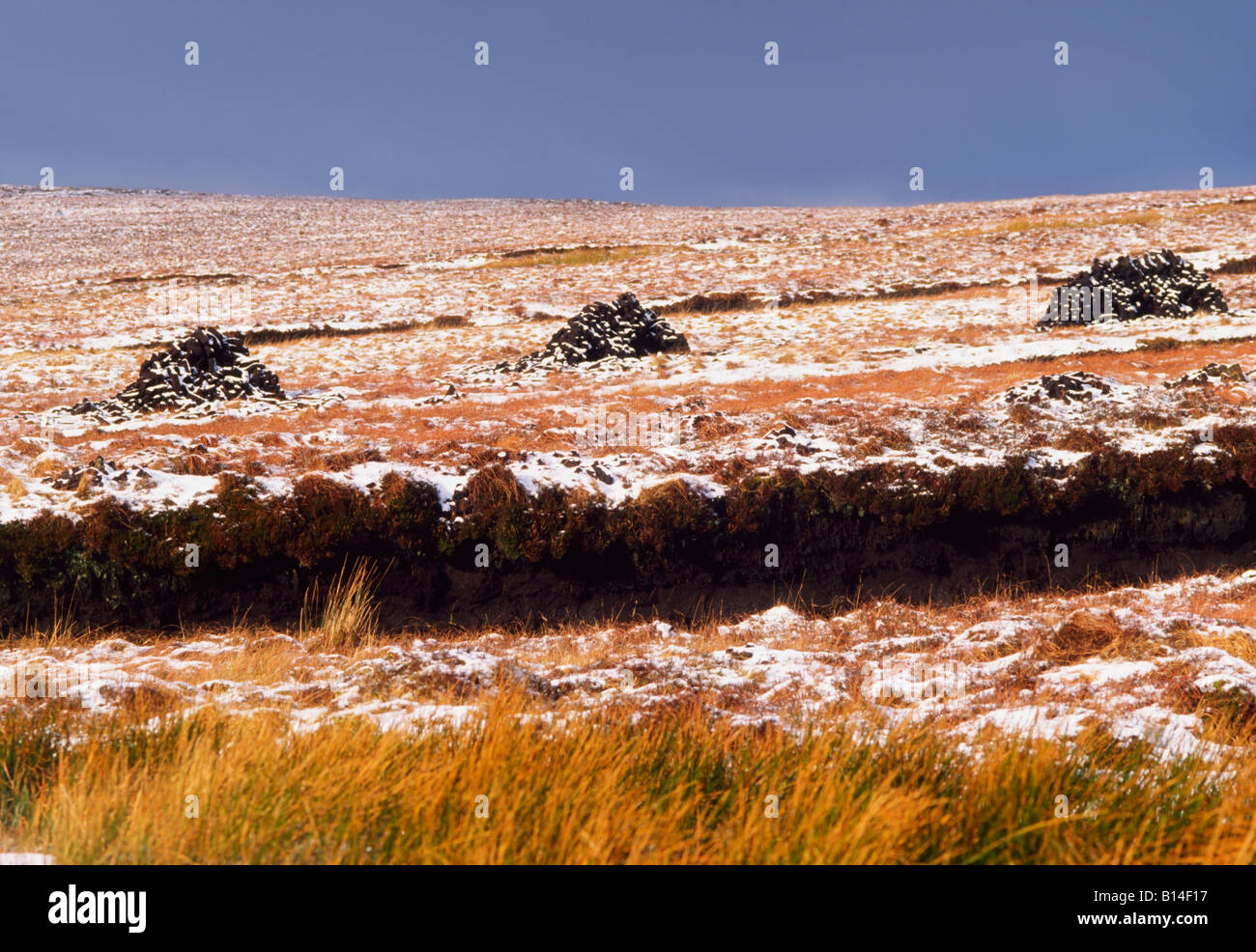 Traditional turf cutting, Ireland Stock Photo - Alamy