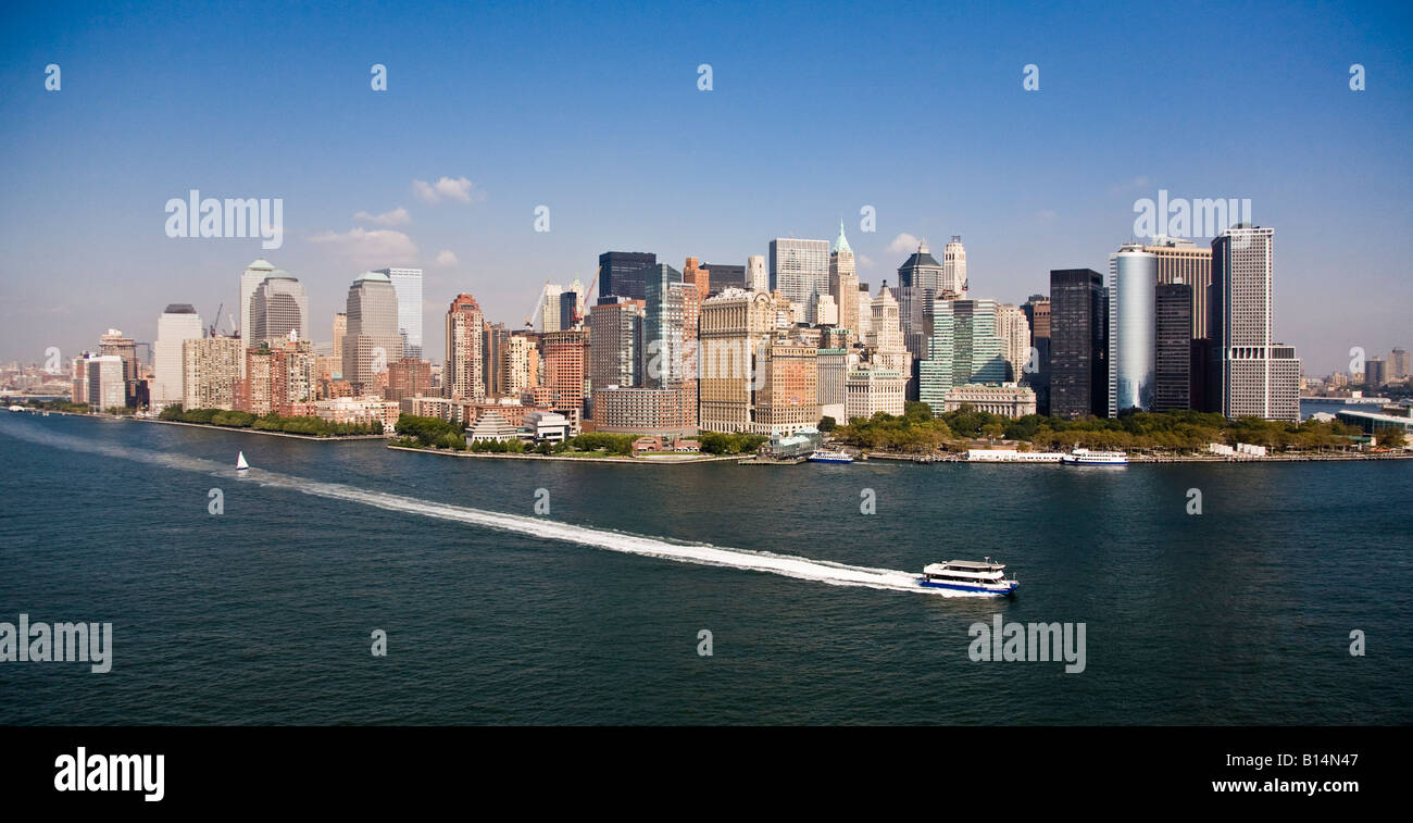 Aerial view of a commuter ferry boat in New York Harbor, with Lower ...