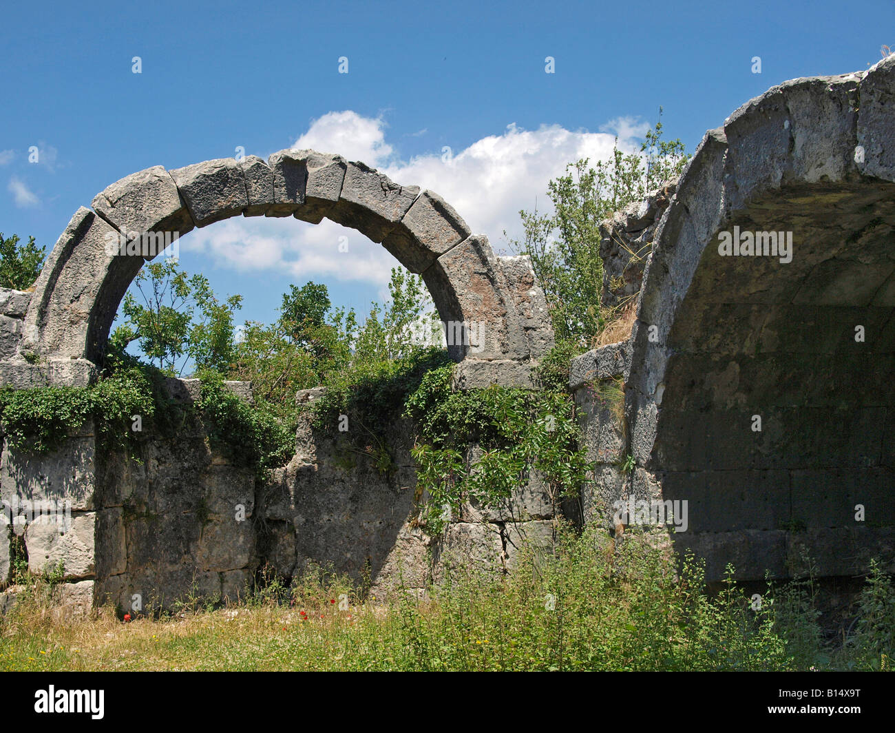 TWO STONE ARCHES AT LYCIAN SITE OF SIDYMA IN THE MODERN VILLAGE OF ...