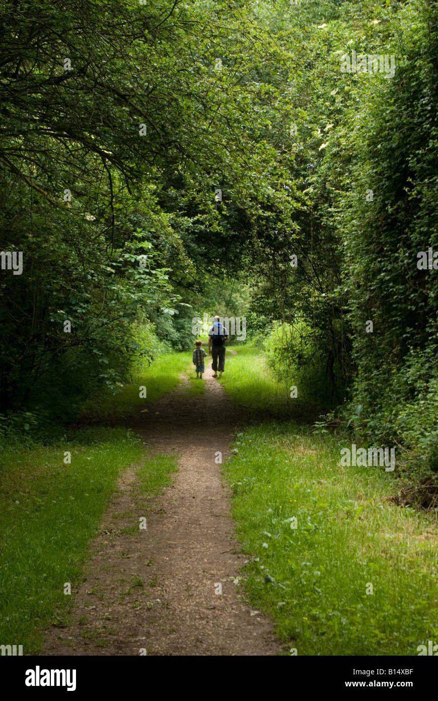 Walking down country lane Stock Photo - Alamy