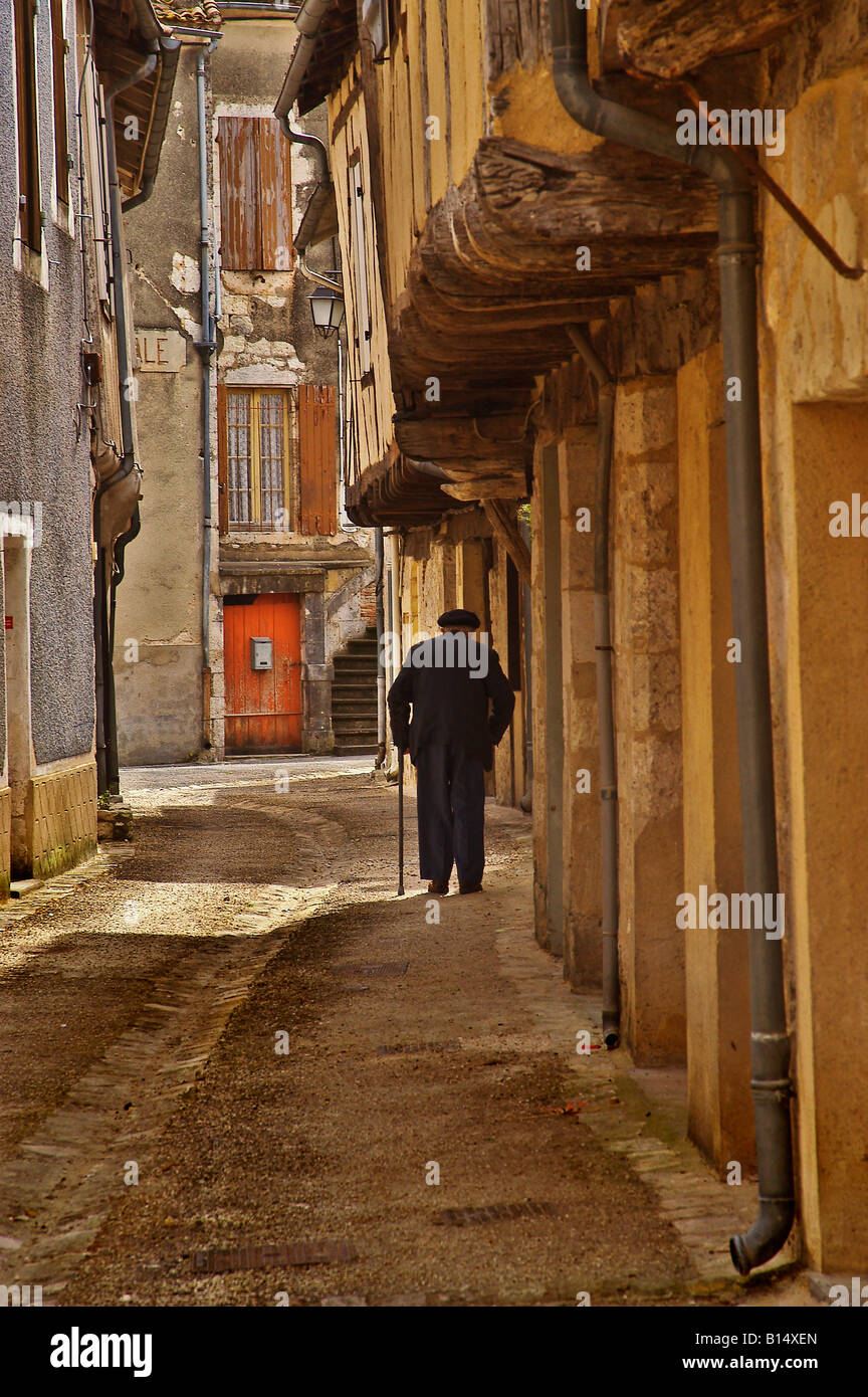 Old man in beret in ancient French village street near Bergerac Stock ...