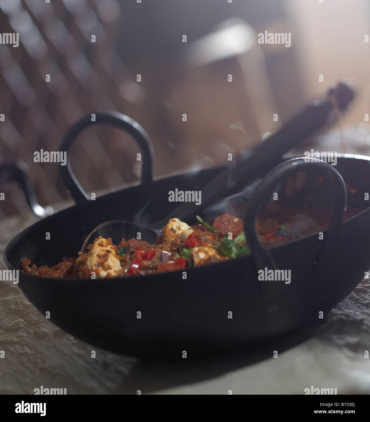 Indian curry steaming Stock Photo - Alamy