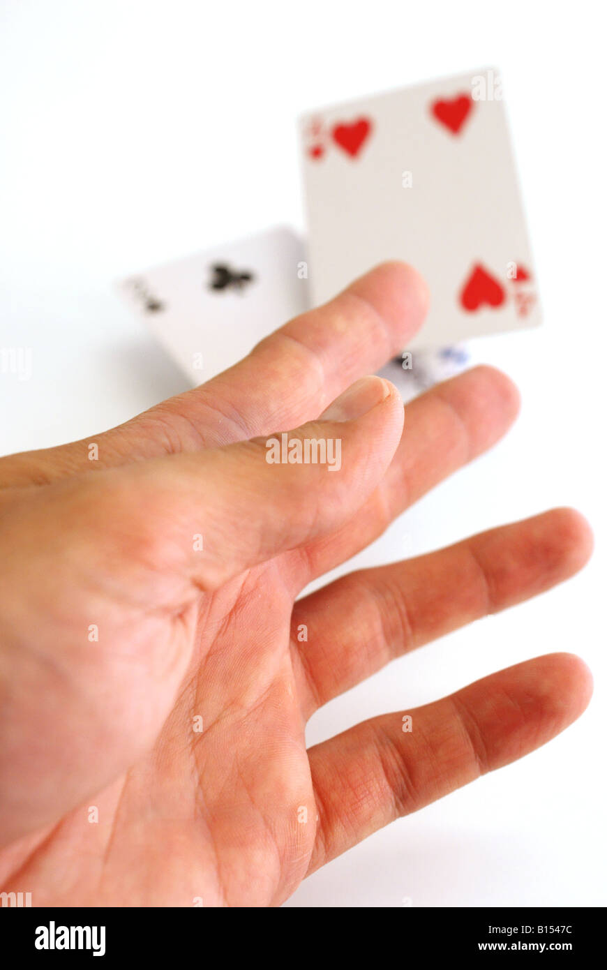 bad poker hand thrown away Stock Photo - Alamy