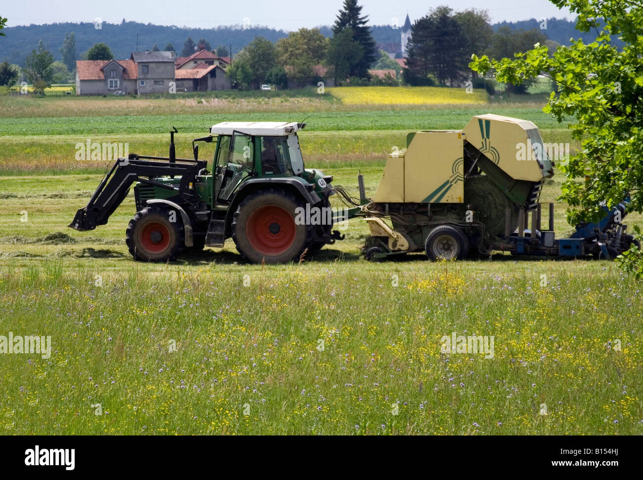 Automatic packing hay hi-res stock photography and images - Alamy