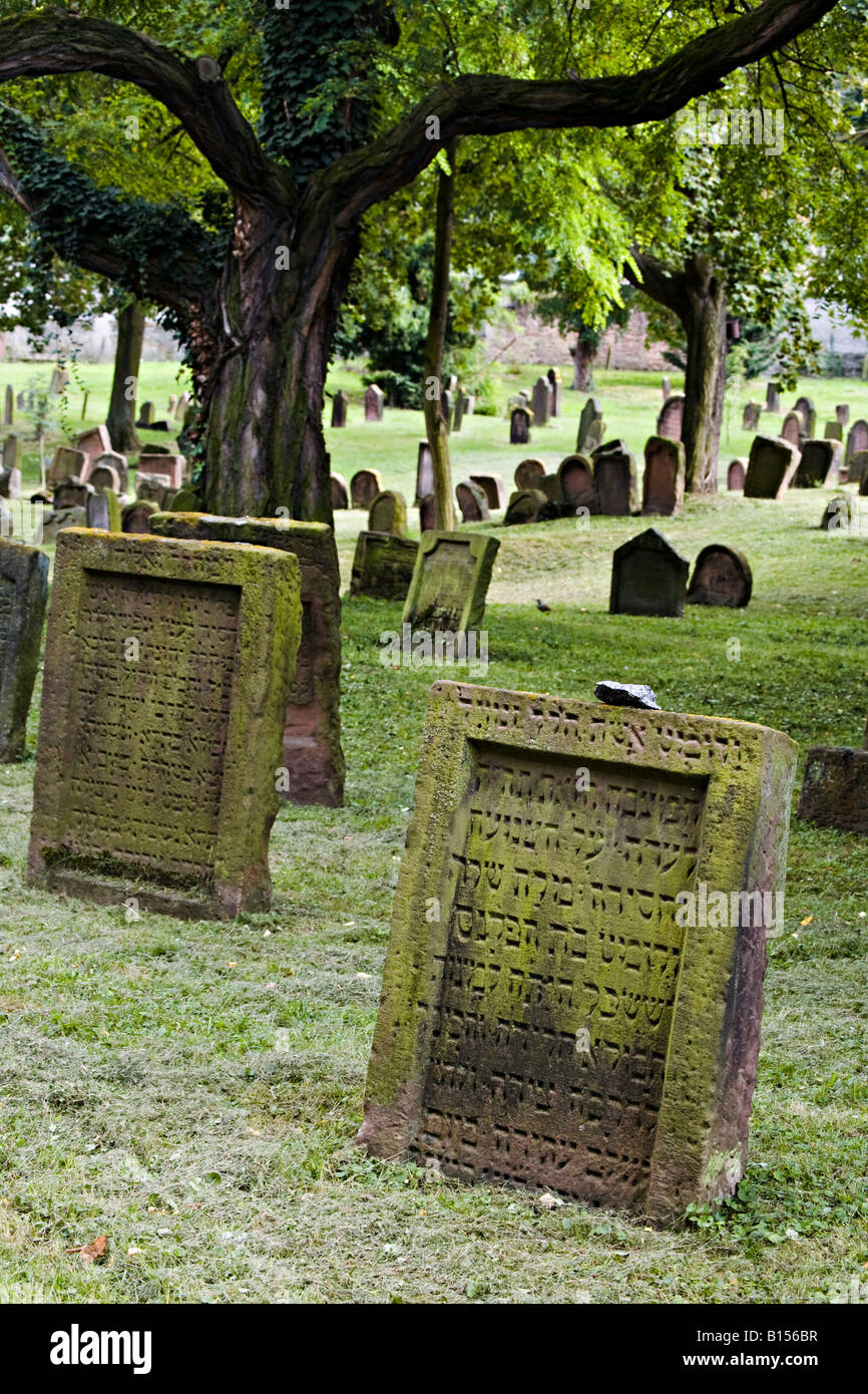 Stone on top of gravestone with Hebrew writing Jewish cemetery the ...