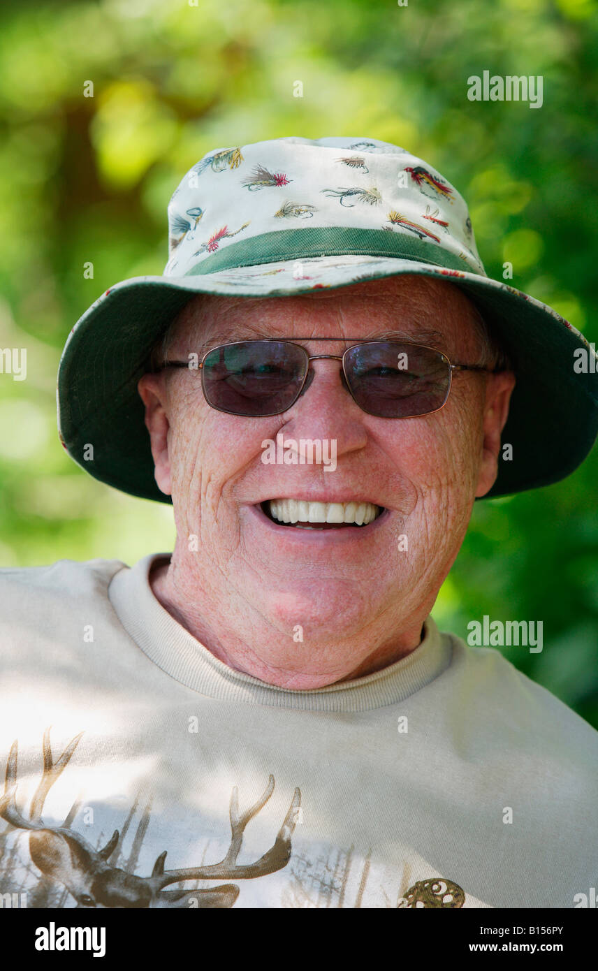 Senior man smiling Stock Photo - Alamy