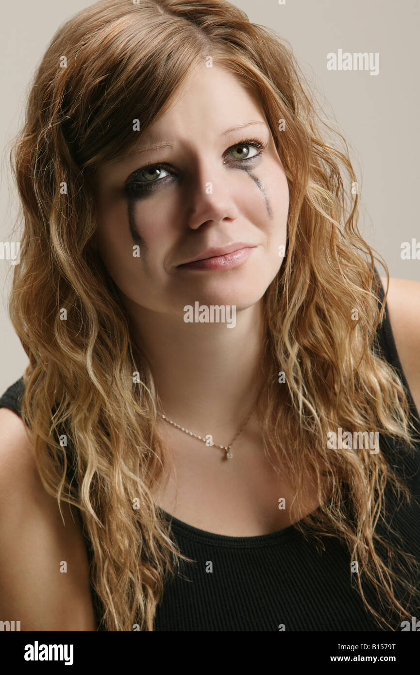 Portrait of a sad woman Stock Photo - Alamy