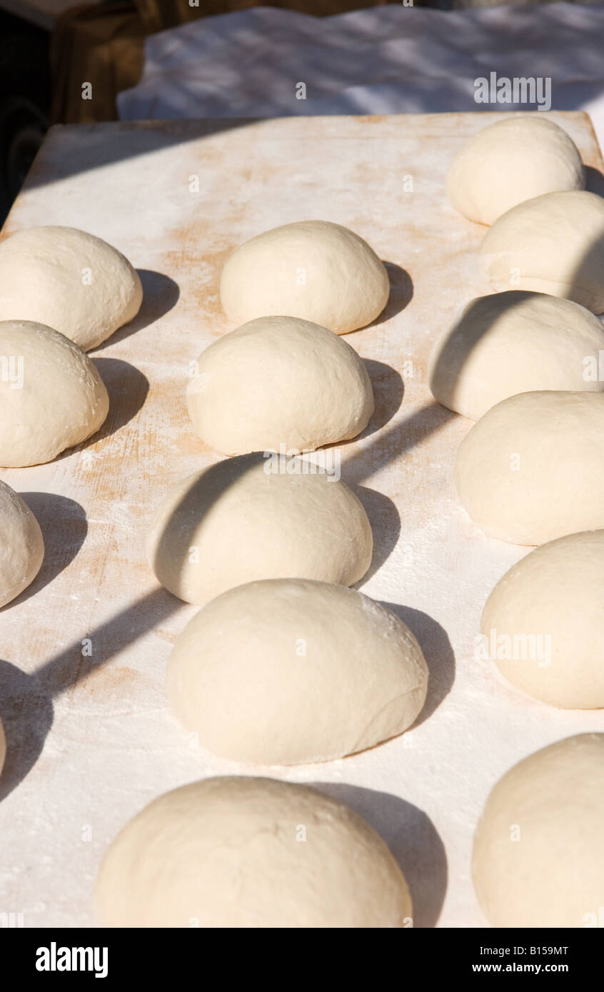 fresh unbaked bread dough formed to loaves Stock Photo - Alamy