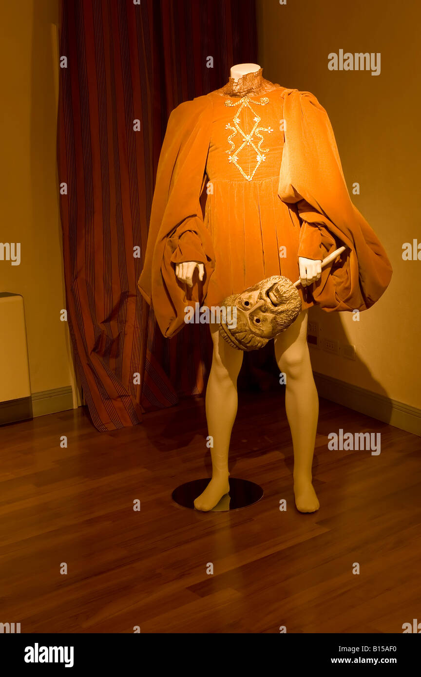 Ancient orange stage costume on a mannequin with mask Stock Photo - Alamy