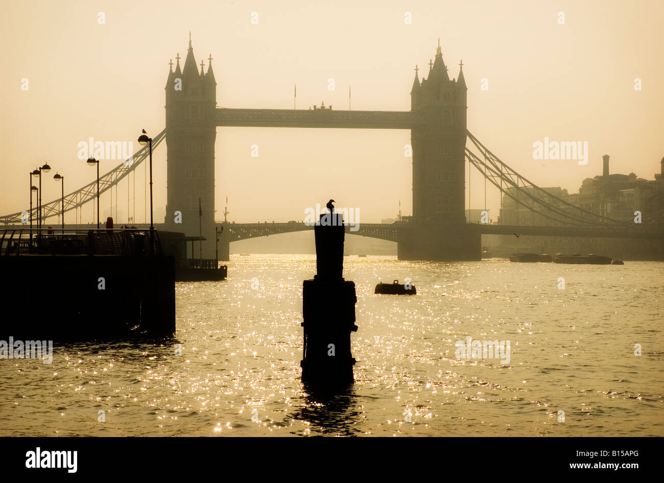 Tower Bridge partially silhouetted on a misty morning Stock Photo - Alamy