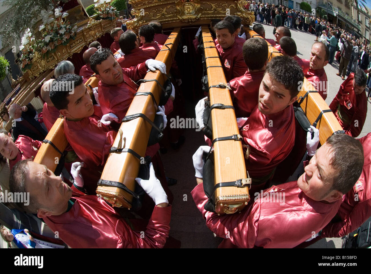 Penitents carry religious statues during Easter Procession in ...