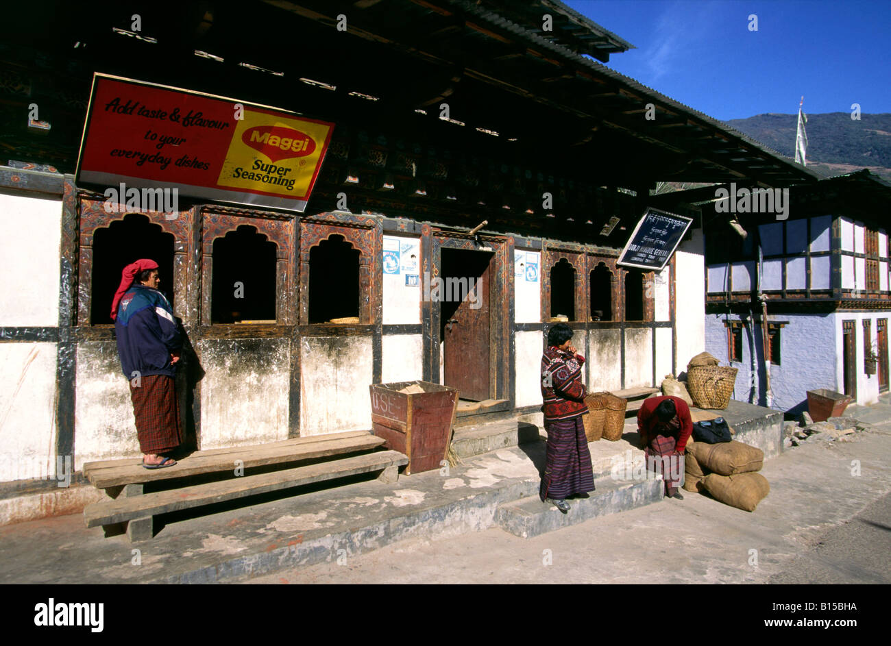 Bhutan Trongsa bazaar decorated shop front Stock Photo - Alamy