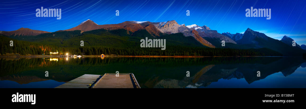 Starry night panoramic of mountains and lake, Jasper National Park ...