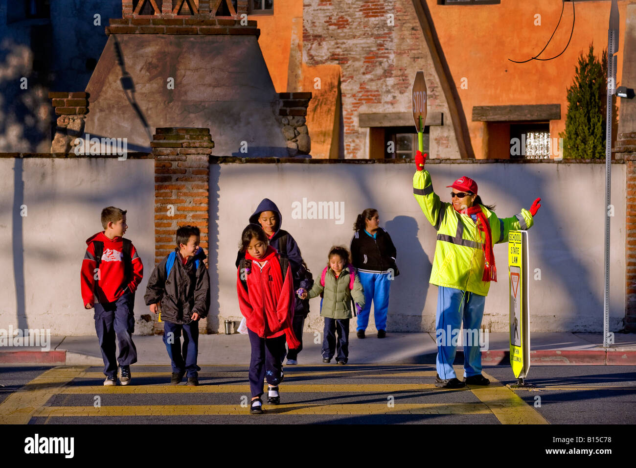 School children crossing street crossing guard hi-res stock photography ...