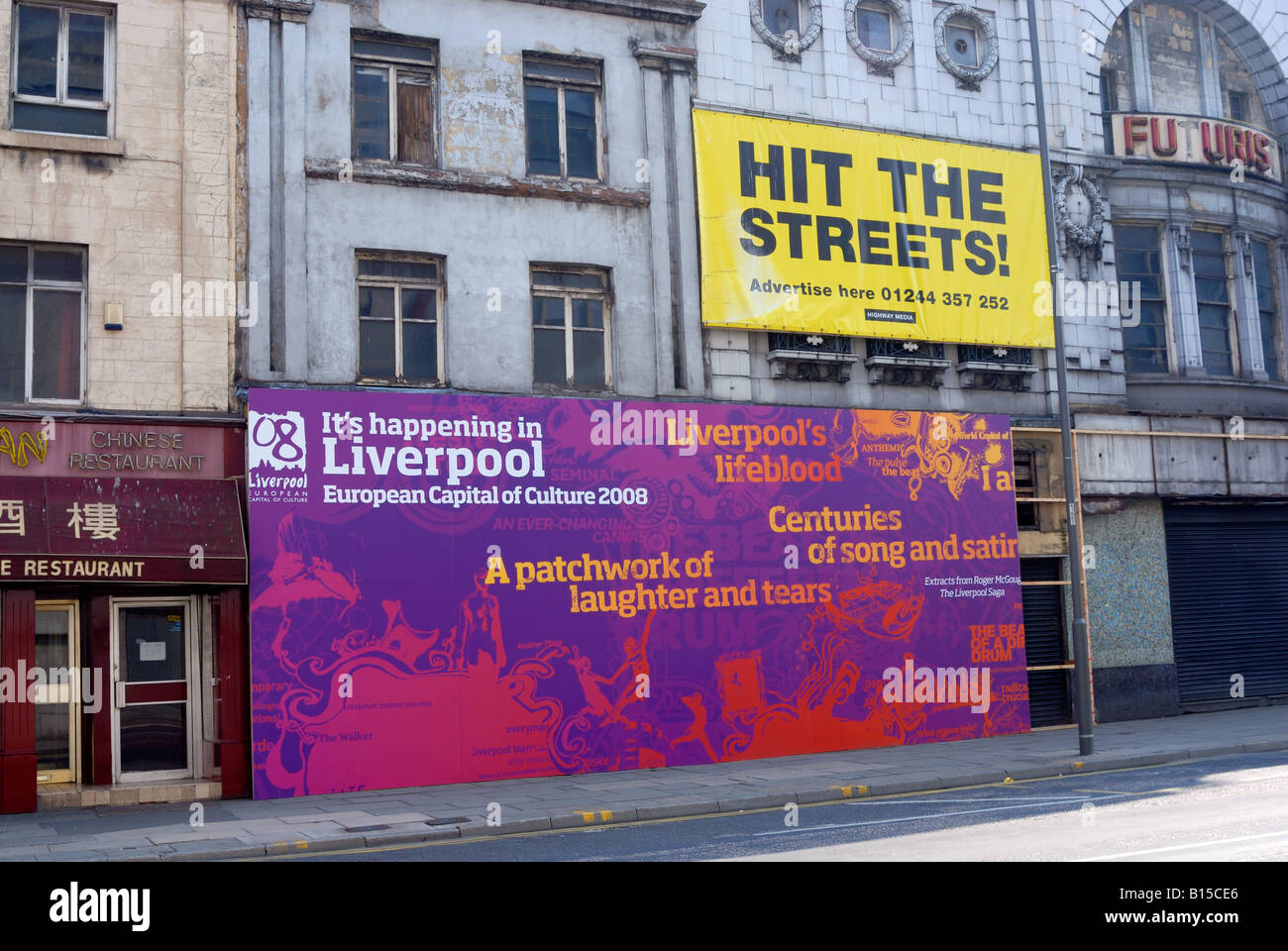 Colourful canvas covering run down semi-derelict premises in Lime ...