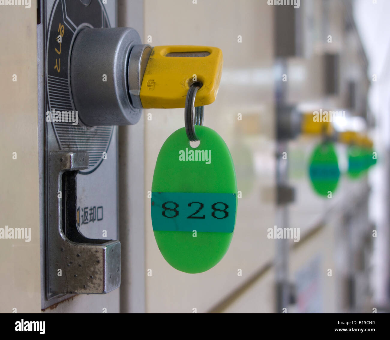 Detail of key in public locker at left luggage in Japan Stock Photo - Alamy