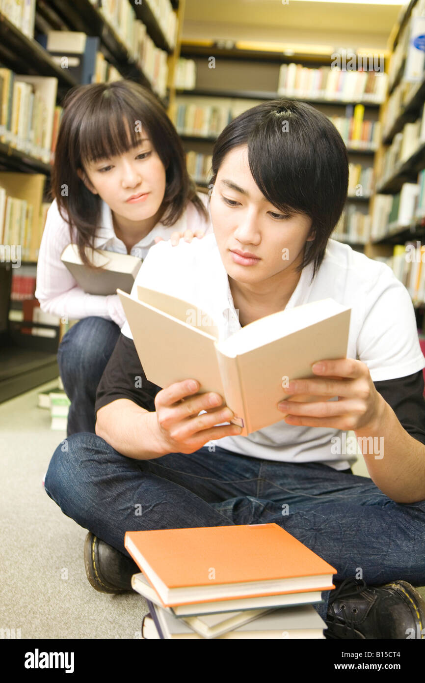 Japanese student reading a book Stock Photo - Alamy