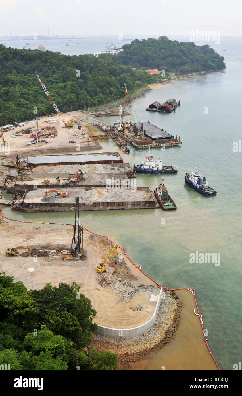 Barges offloading bulk materials for the construction of Resorts World ...