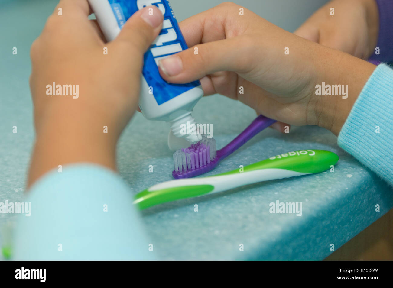 Toothbrush and toothpaste Stock Photo - Alamy