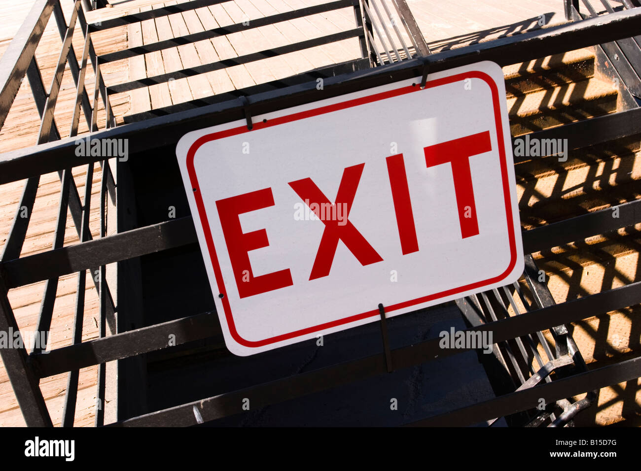 Exit sign attached to a metal enclosure Stock Photo - Alamy