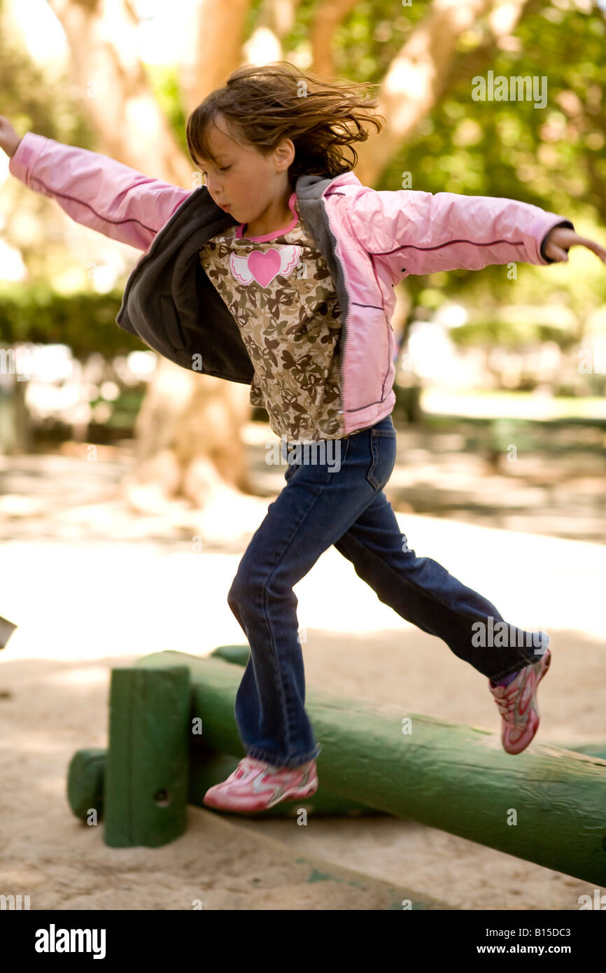 six year old girl jumping Stock Photo - Alamy